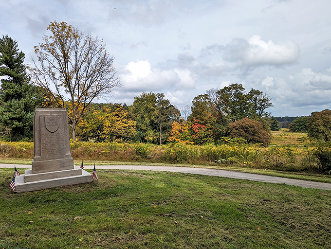 This simple monument marks where complex history happened, standing sentinel over meadows that once hosted an army fighting for freedom.