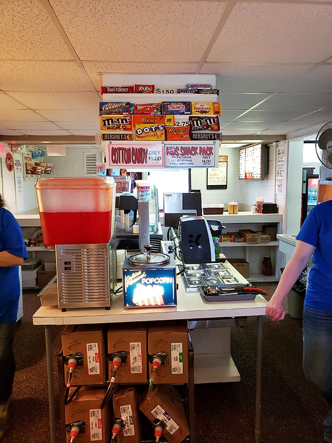 The beating heart of any drive-in experience: that glorious concession counter where popcorn dreams come true and sodas flow freely.