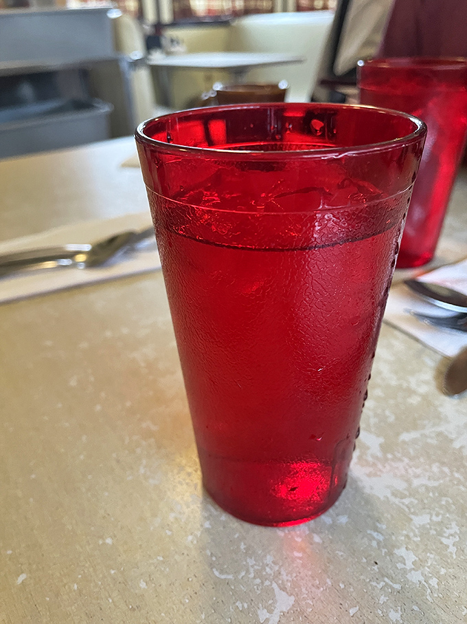 That ruby-red beverage in a classic diner tumbler&mdash;where the condensation on the outside promises relief from whatever ails you.
