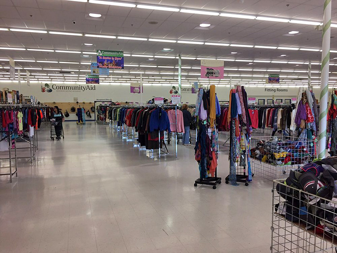 Racks stretching toward infinity &ndash; the IMAX experience of thrift shopping where time mysteriously disappears.