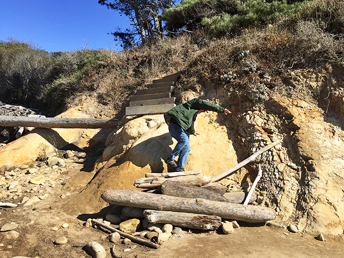 The path less traveled sometimes requires actual climbing. This makeshift stairway to beach heaven separates casual tourists from determined explorers.