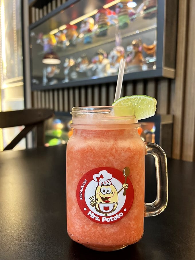 This mason jar of strawberry refreshment isn't just a drink&mdash;it's Florida sunshine in liquid form, complete with the smiling potato mascot who seems equally delighted about your beverage choice. 