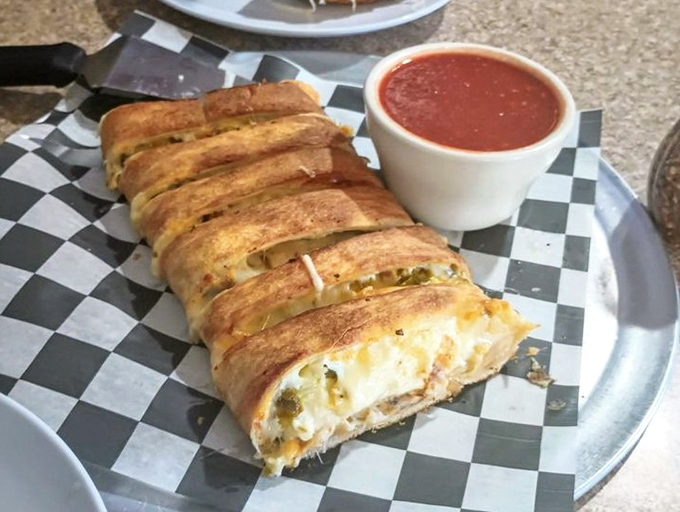 Stromboli: pizza's sophisticated cousin who studied abroad. Perfectly golden with cheese peeking out just enough to make you salivate.