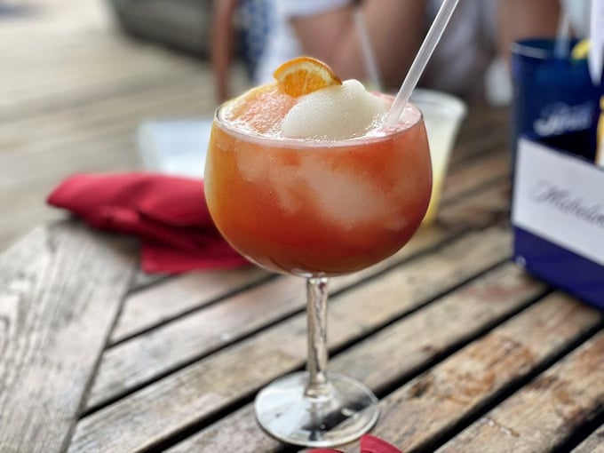 This sunset-hued cocktail doesn't just quench thirst&mdash;it tells stories of ocean breezes and Carolina summers in every sip.