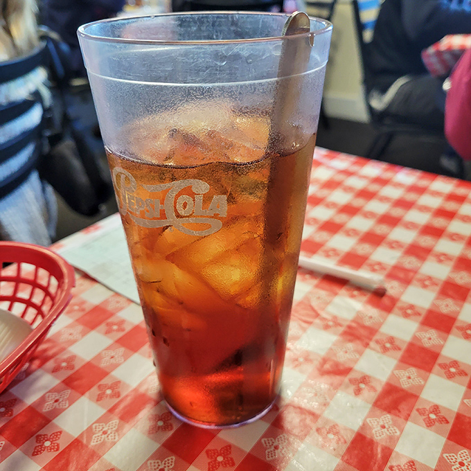 Sweet tea so perfectly balanced it should teach a masterclass&mdash;amber-colored liquid sunshine in a glass that never seems to empty.