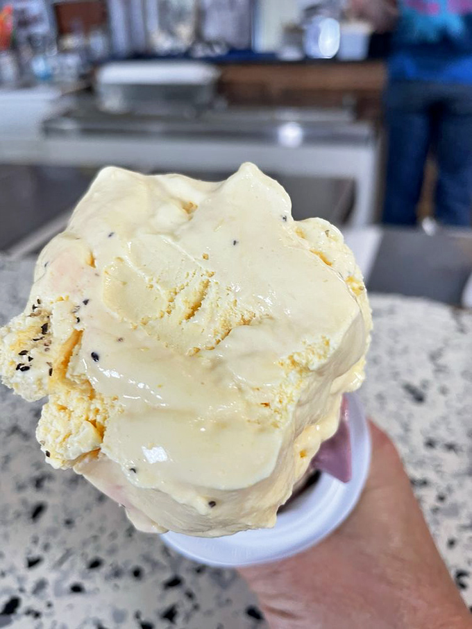 Blue ice cream that promises childhood wonder with every spoonful – no artificial coloring needed when flavor does all the talking.