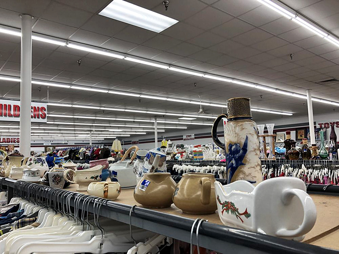 Teapots and pitchers stand at attention like ceramic soldiers, each with stories of dinner parties past and ready for entertaining futures.
