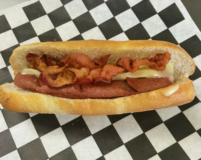 Melted cheese embracing meat like long-lost friends at a reunion. This sandwich doesn't just satisfy hunger—it creates happiness.