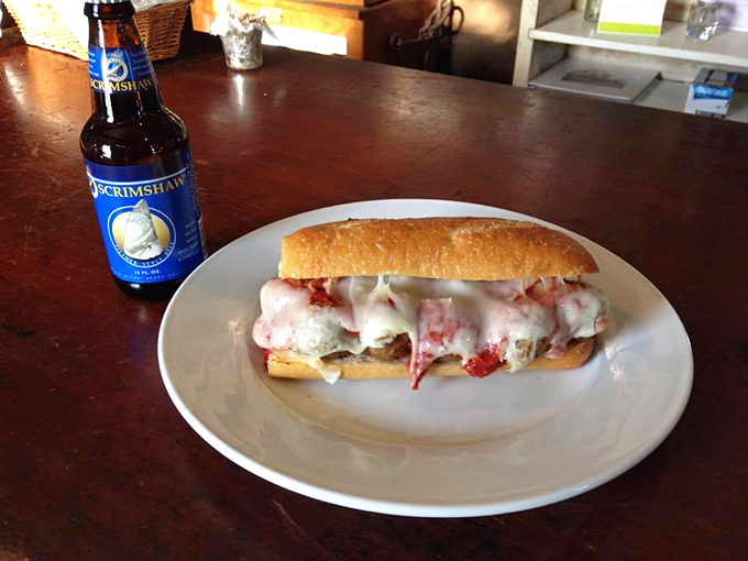 The Manchester Meatball sandwich lounges on its plate like it knows something you don't. Paired with a local brew, it's California comfort in edible form.