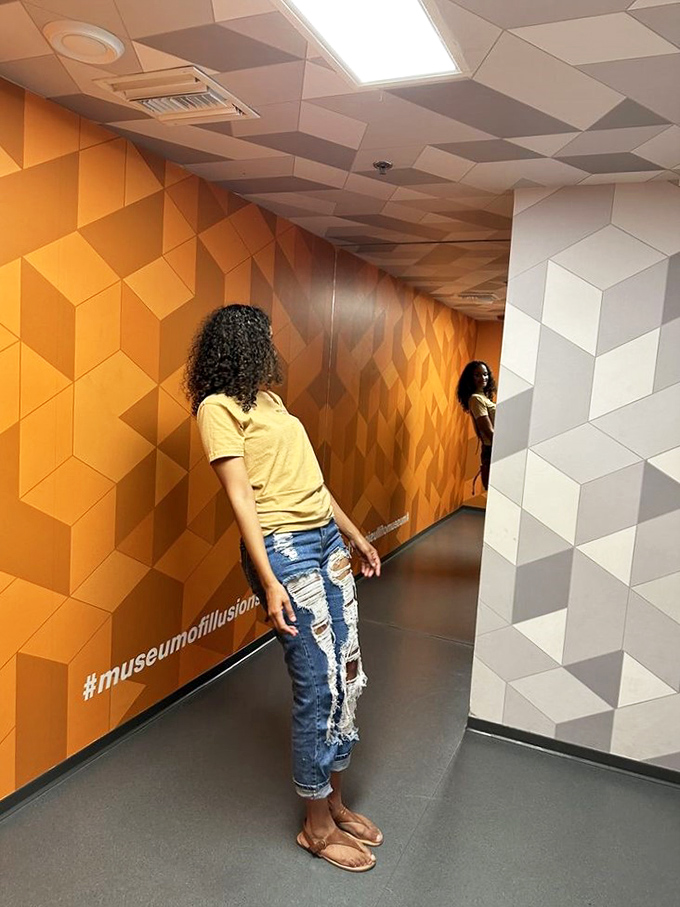 Walking down this geometric hallway feels like stepping into an M.C. Escher drawing that's having an identity crisis.