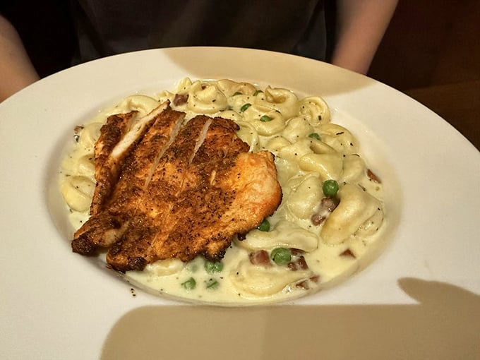 Tortellini bathed in cream sauce with perfectly seasoned chicken&mdash;comfort food that hugs you from the inside out while whispering, "Diet? What diet?"