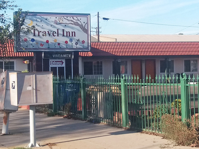 The Travel Inn's vintage sign and terracotta roof harken back to road trips before GPS, when discovery happened by happy accident.