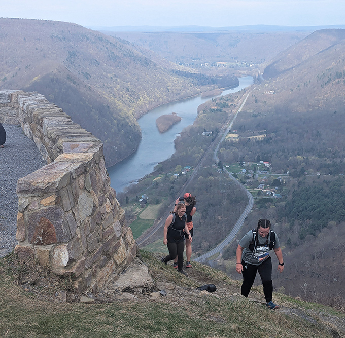 The final climb to the viewpoint—where hikers earn their reward one labored step at a time. The steeper the climb, the sweeter the view.
