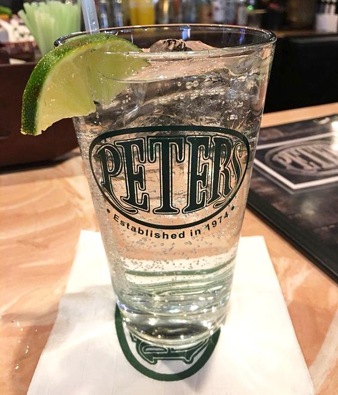 A crisp vodka soda in Peter's signature glass with a lime wedge&mdash;sometimes the simplest pleasures are the most refreshing.