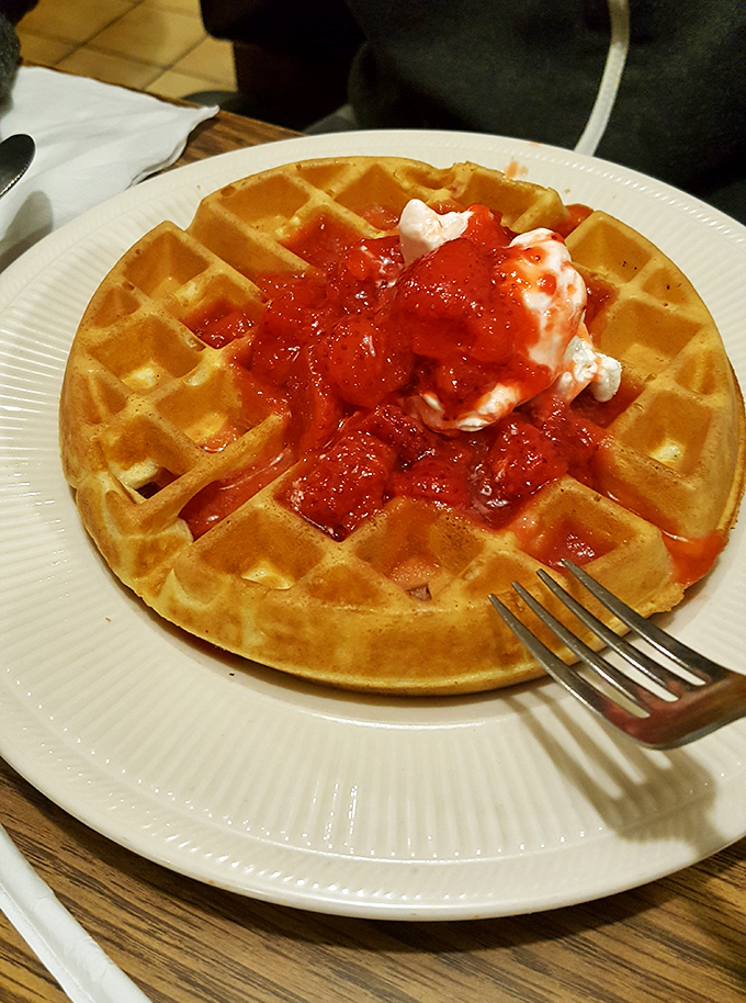 That golden waffle doesn't just hold strawberries and cream&mdash;it cradles summer memories and childhood joy in every perfect square.