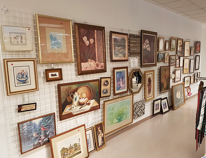 The wall where art comes to find new admirers. One person's "doesn't match the new couch" becomes another's perfect statement piece. 