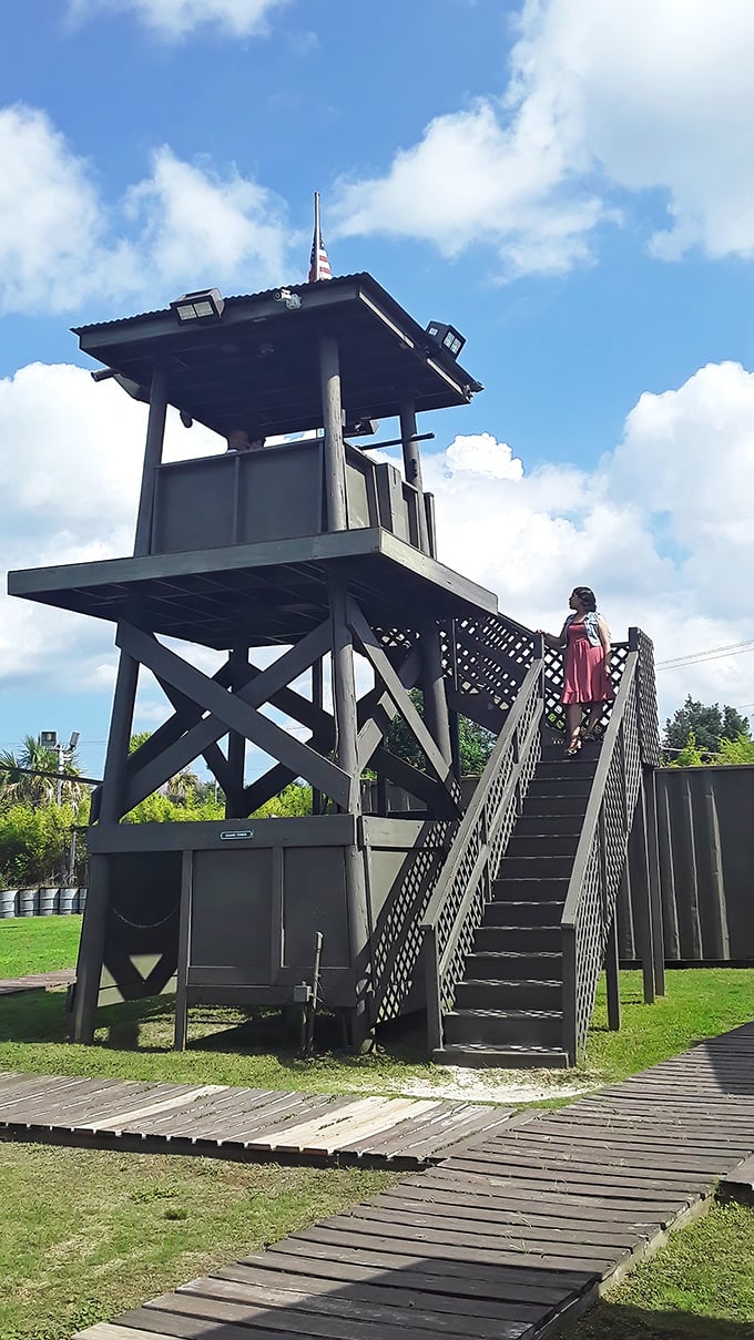 This Vietnam-era watchtower stands guard over the immersive exhibit, a stark reminder of vigilance in a jungle far from South Carolina's palmettos.