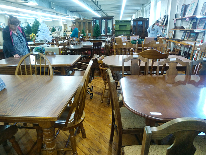 Dining tables stand at attention like wooden soldiers. Each one has hosted countless family dinners and is ready for an encore performance.