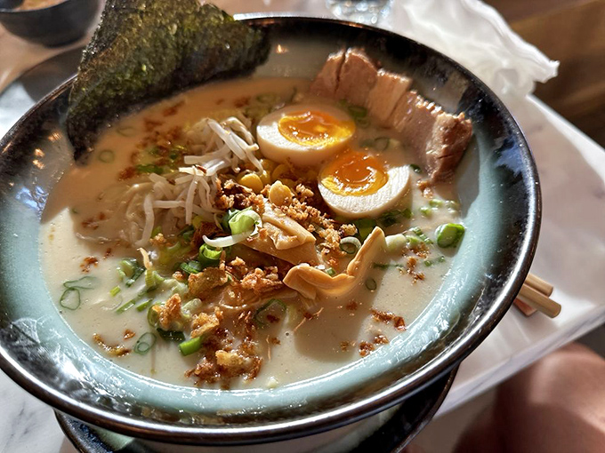 A ramen bowl that whispers sophistication while shouting flavor &ndash; those soft-boiled eggs are practically winking at you.
