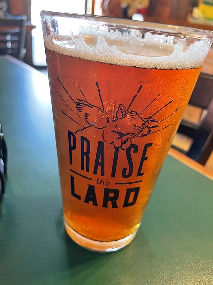 "Praise the Lard" isn't just clever wordplay&mdash;it's the appropriate response after your first sip of this amber brew alongside smoky barbecue perfection.
