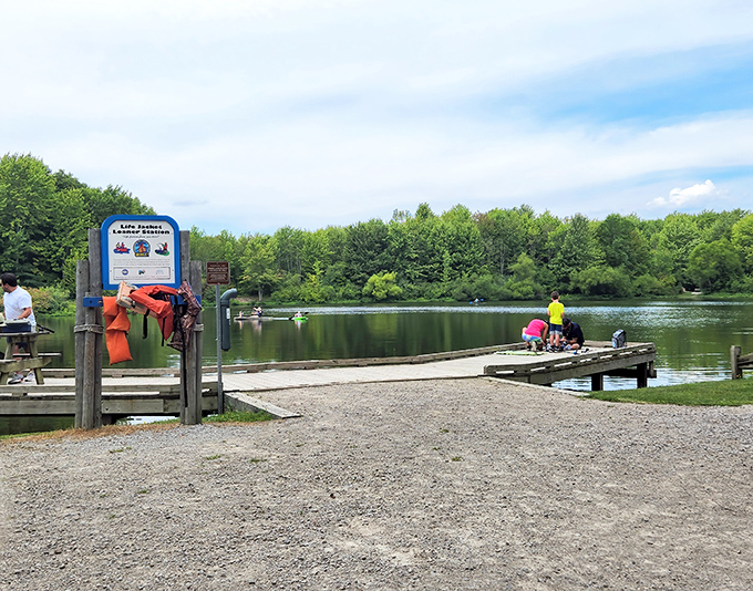 Family fishing adventures begin at the dock. Life jackets and excitement abound as kids discover the simple joy of dropping a line in still waters.
