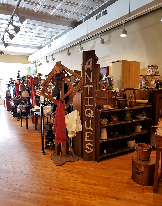 The "ANTIQUES" sign stands sentinel over a collection that ranges from practical farmhouse finds to conversation-starting oddities.
