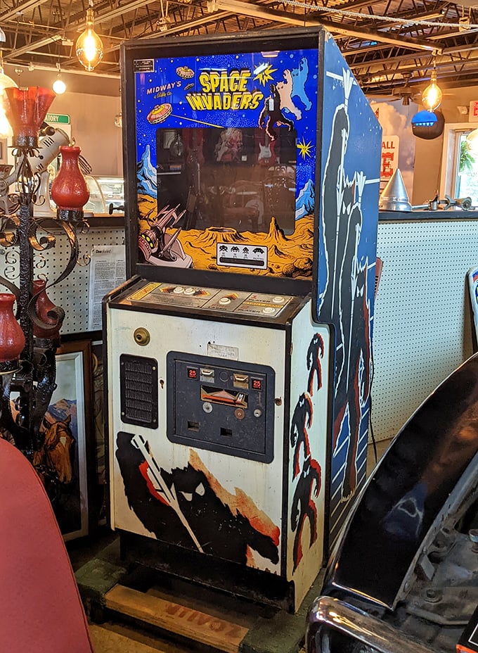 Space Invaders arcade cabinet&mdash;where Gen X nostalgia meets collectible art, and quarters once disappeared faster than allowances.