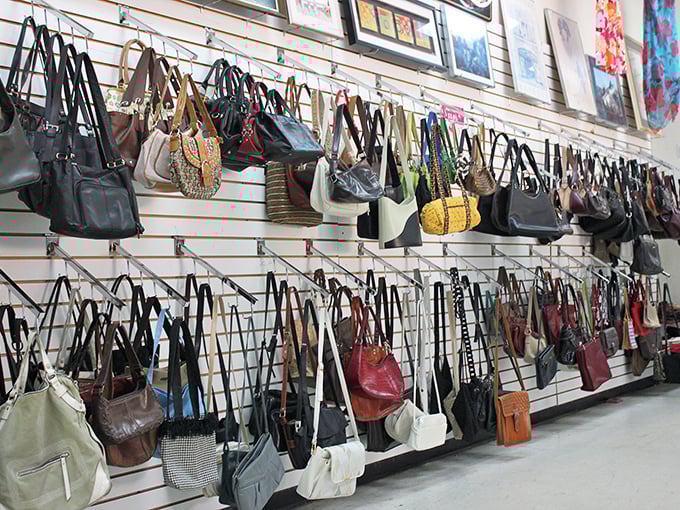 Handbag heaven! Designer lookalikes and genuine vintage finds hang like fashionable fruit, ripe for the picking.