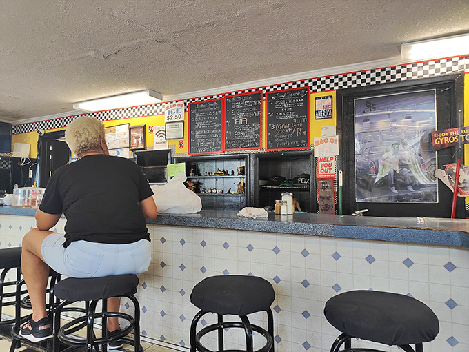 Where the magic happens—the counter where regulars perch and newcomers become family. Coffee flows as freely as conversation.