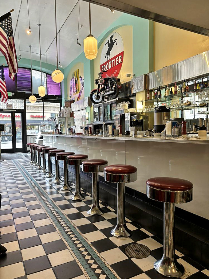 The counter at Lori's&mdash;where strangers become temporary neighbors, united by chrome, vinyl, and the universal language of comfort food.