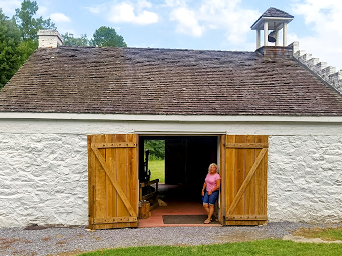 This historic white barn doesn't just store history&mdash;it displays it with barn doors flung wide open, inviting you into Pennsylvania's agricultural past.