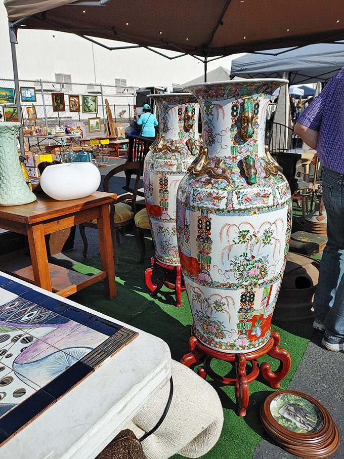 Ornate Asian vases stand tall as silent sentinels, their intricate patterns telling centuries-old artistic stories. 