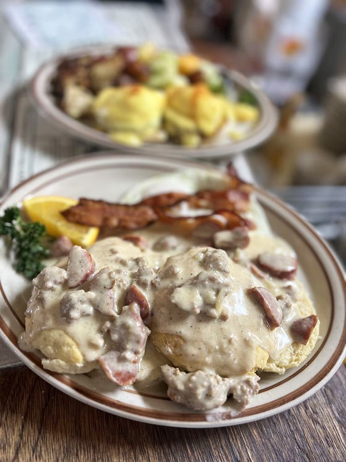 Biscuits swimming in gravy that's practically a religious experience. The kind of dish that makes you want to hug the chef and schedule extra cardio.
