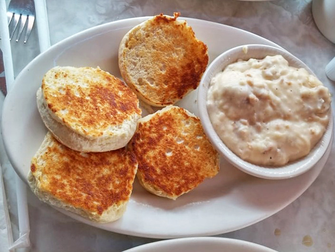 Fluffy biscuits swimming in sausage gravy &ndash; the kind of Southern comfort that makes Yankees reconsider everything.