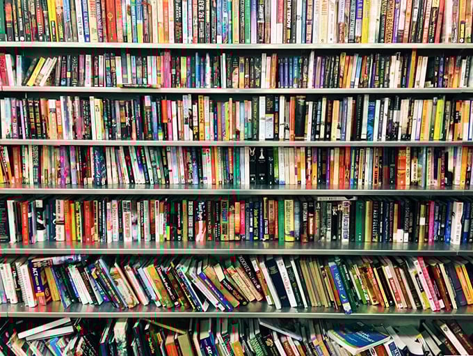 A library where every book costs less than a latte. Literary treasures stacked with the density of a graduate student's nightstand.