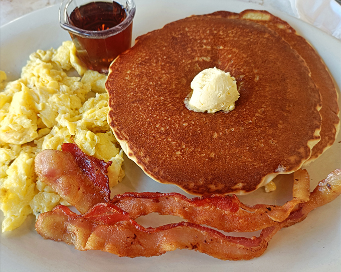 Breakfast perfection isn't complicated&mdash;just a pancake the size of your face, eggs that respect their mission, and bacon that means business.