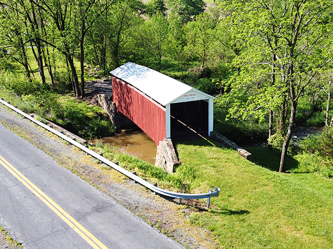 From above, it looks like a Monopoly house that decided to grow up and span water.
