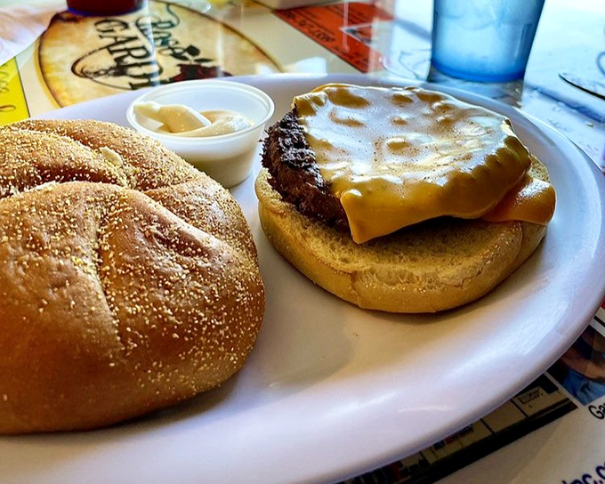This isn't just a burger&mdash;it's architectural perfection between two buns, with those golden fries standing at attention alongside.