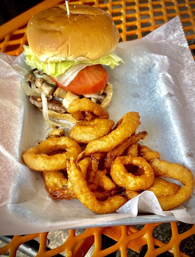 Curly fries that dance around a burger like they're auditioning for a food commercial. The supporting cast that steals the show.