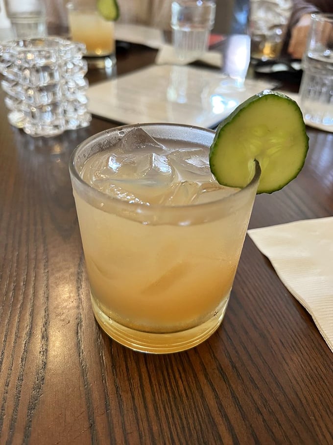 A refreshing Charleston cocktail that says "vacation" with every sip. That cucumber garnish isn't just pretty&mdash;it's a promise of southern refreshment