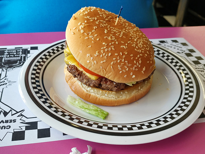 A proper diner cheeseburger doesn't need truffle aioli or a brioche bun&mdash;just honest beef, melty American cheese, and a pickle spear standing guard.