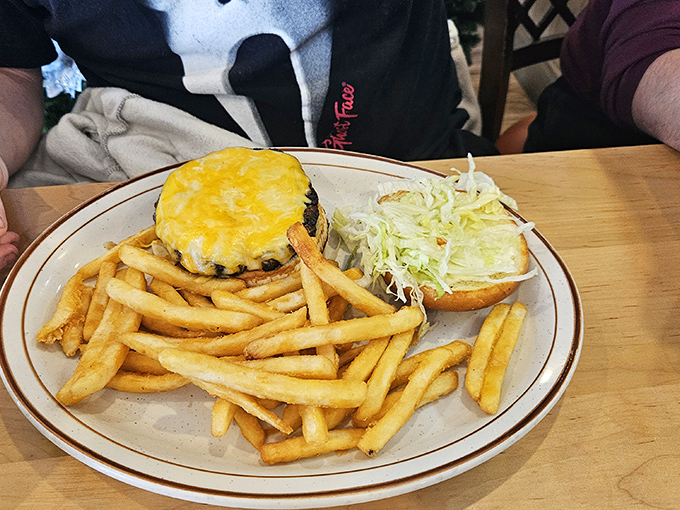 A proper diner cheeseburger doesn't need fancy toppings or a clever name. Just quality beef, melted cheese, and fries that could start their own fan club.