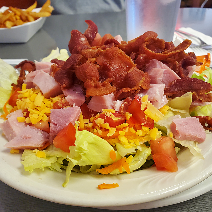 The chef salad that defies all "eating light" intentions. When vegetables are merely the supporting cast for a mountain of ham, cheese, and bacon, you know you're in Indiana.