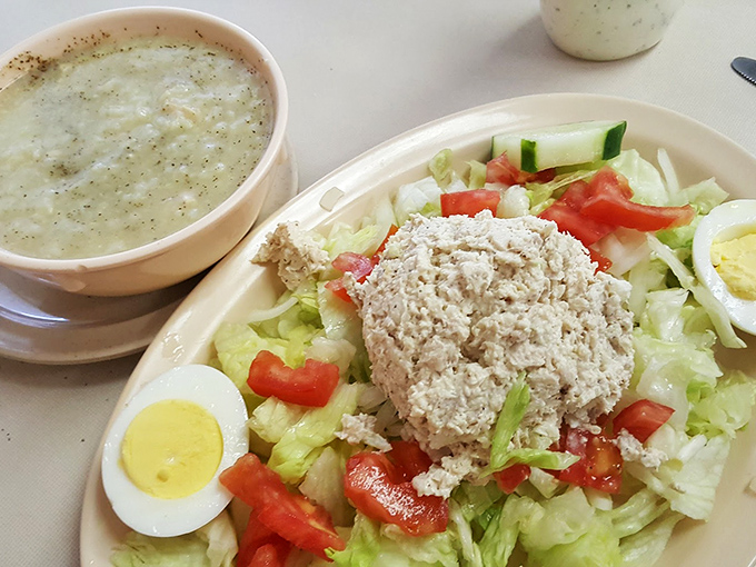 A chicken salad that actually looks like chicken, paired with soup that promises to comfort—lunch that your grandmother would approve of.