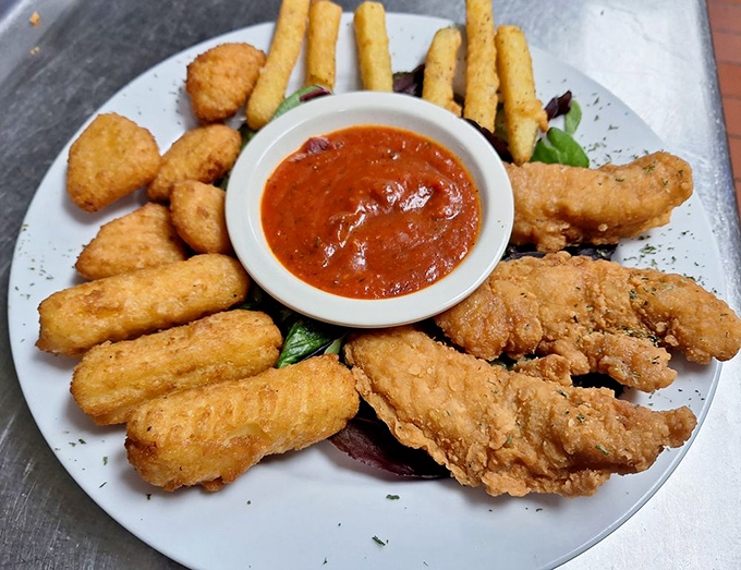 Chicken tenders that actually taste like chicken&mdash;imagine that! Crispy, golden-brown armor protecting juicy meat, with dipping sauce standing by for duty.