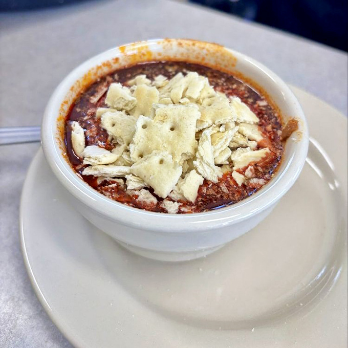 Chili topped with saltine crackers&mdash;comfort food mathematics at its finest. The bowl might be white, but the memories it creates are technicolor.