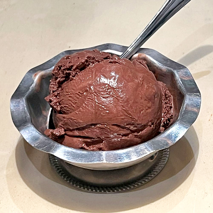 Chocolate so intense it should come with a warning label. This isn't just dessert&mdash;it's therapy in a silver dish.