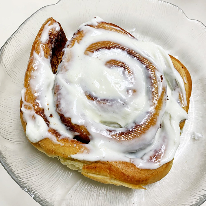 Not all cinnamon rolls are created equal. This one looks like it graduated with honors from Pastry University, that glaze diploma proudly displayed.