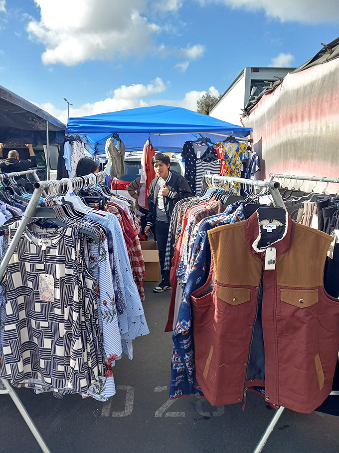 Fashion archaeology in progress. Between these racks hides the perfect vintage find that will have friends asking, "Where did you get that?"