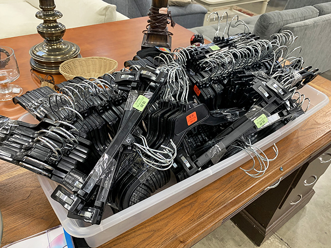 A sea of black hangers holding potential new wardrobes. The thrill isn't just in the savings&mdash;it's in finding that designer label hiding in plain sight.